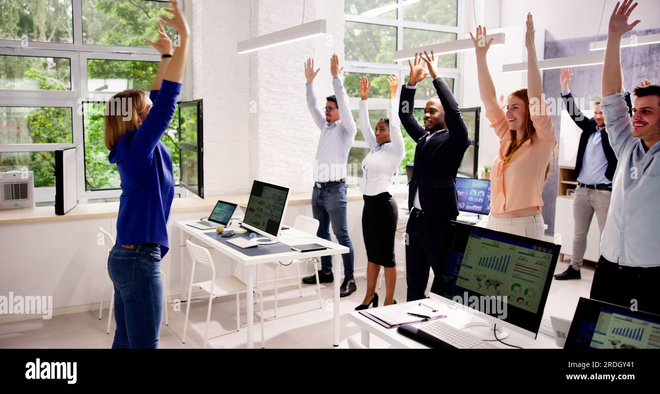 Stretch Exercise In Office For Business Worker Team Stock Photo - Alamy
