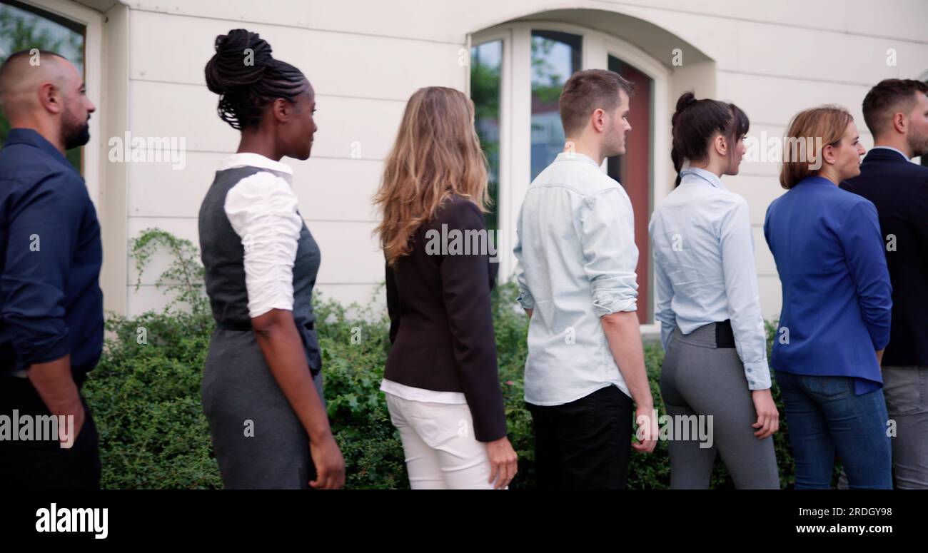 Queue Outdoors. Business People Waiting In Line Stock Photo - Alamy