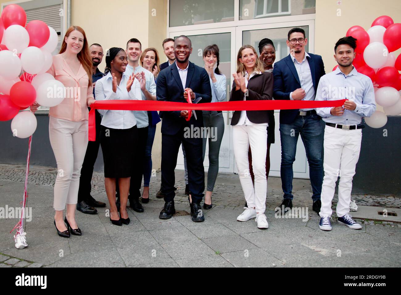 Ribbon Cut Ceremony Outdoors. Building New Business Stock Photo - Alamy