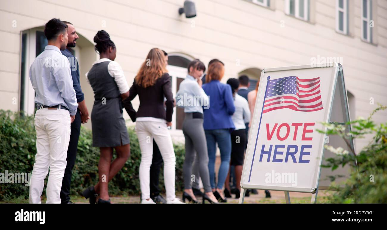 Diverse People At Voting Booth. Vote Here Elections Sign Stock Photo ...