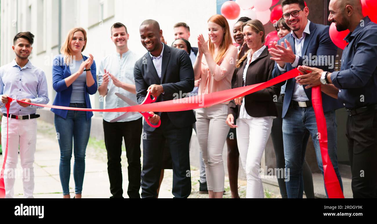 Ribbon Cut Ceremony Outdoors. Building New Business Stock Photo - Alamy