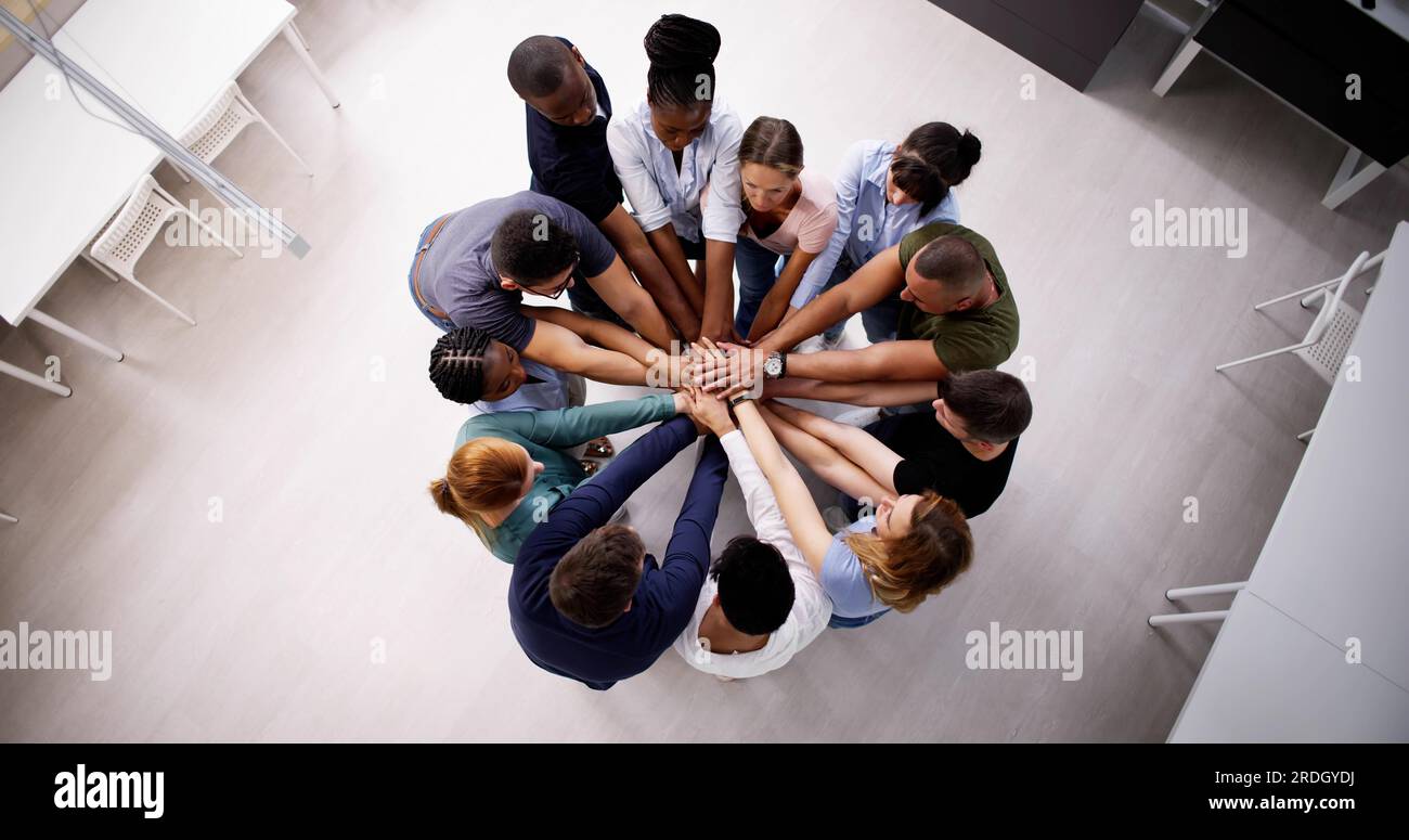 Business Team Huddle. Diverse Friends Hands Commitment Stock Photo - Alamy