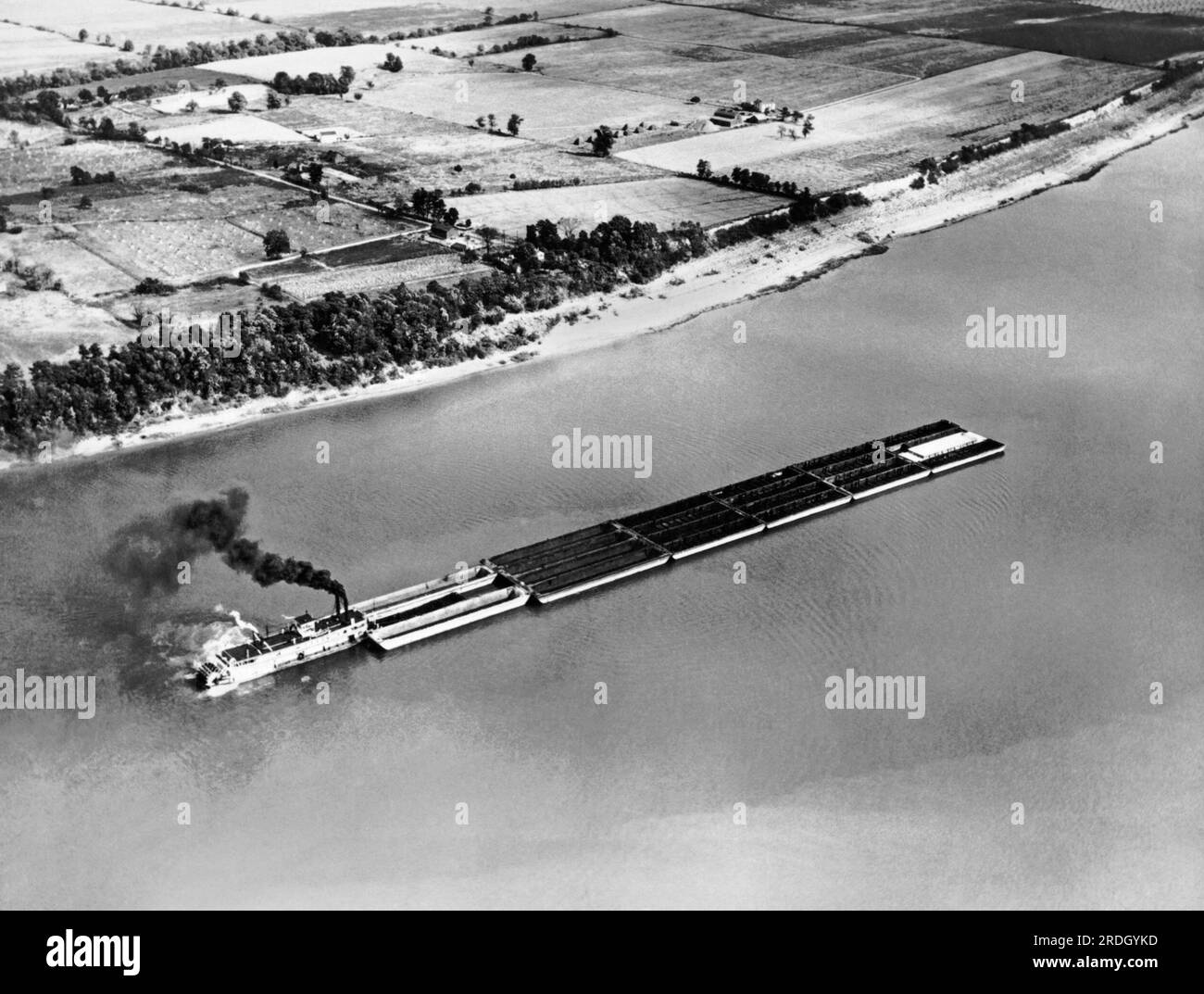 United States June 14, 1940 An aerial view of a sternwheeler river boat ...