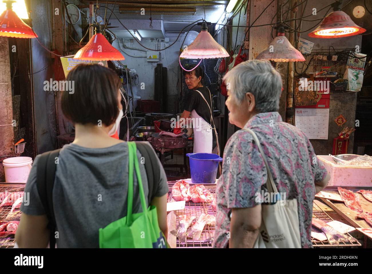 Hong Kong, China. 07th July, 2023. People seen buying fish at a fish ...
