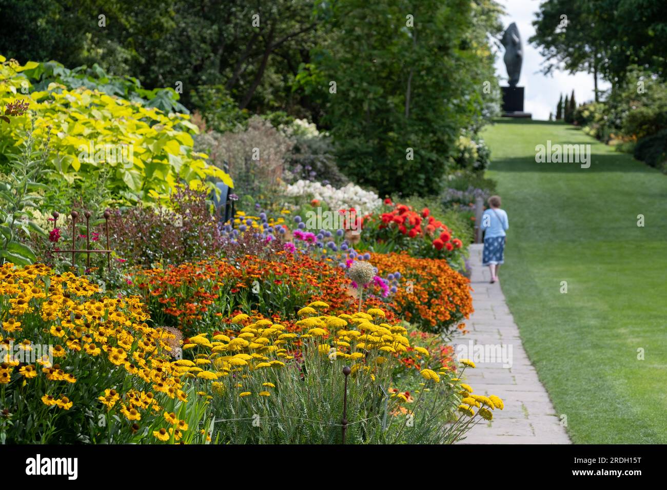 Woman planting perennials border hi-res stock photography and images ...