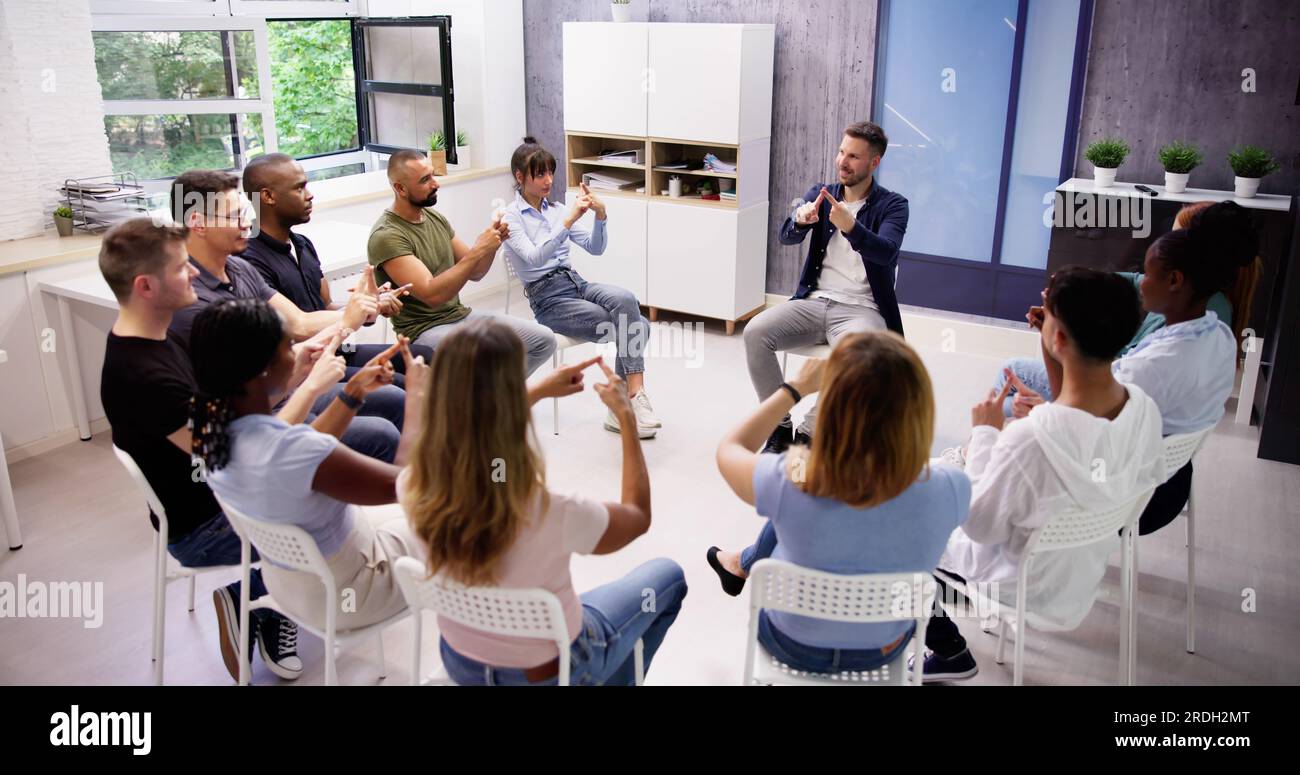 Sign Language Class For People With Disability Stock Photo - Alamy