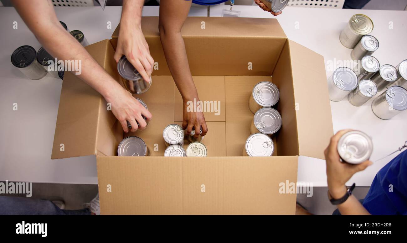 Food Drive Bank. Donating Tin Can Box Stock Photo - Alamy