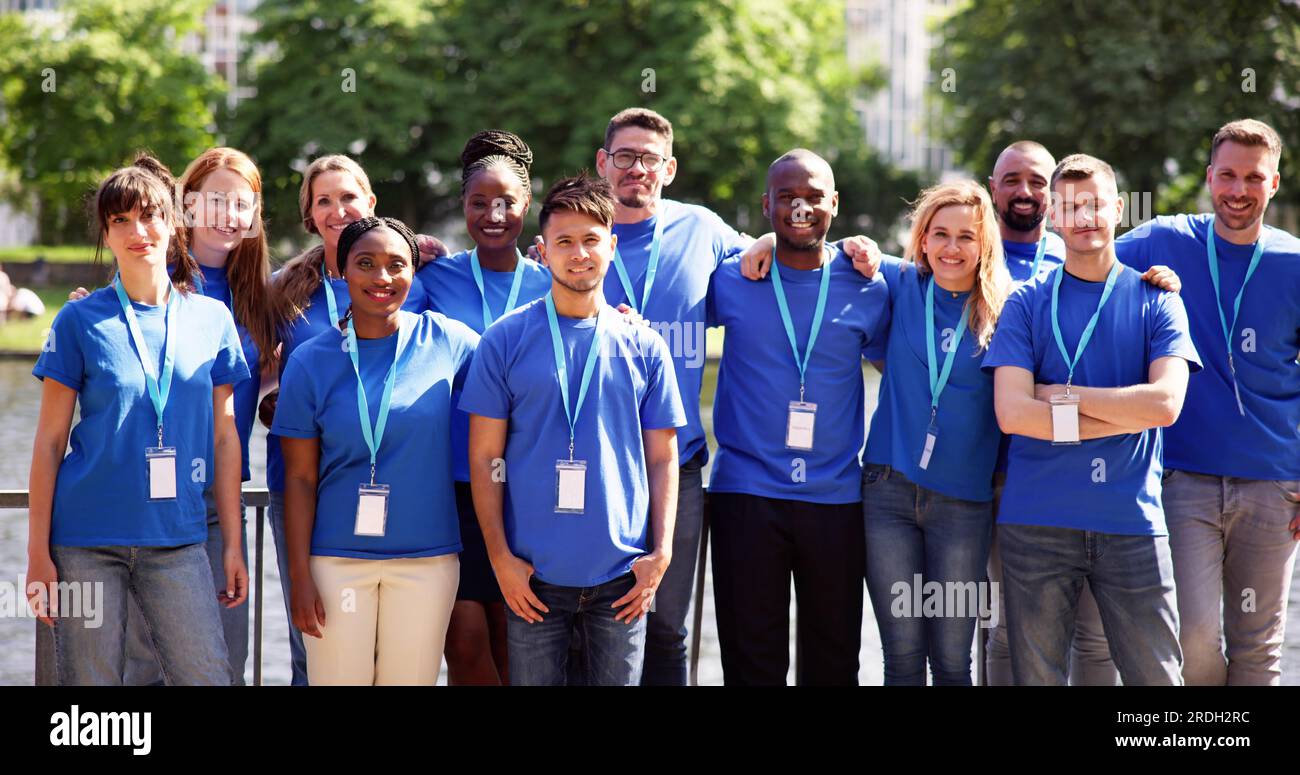 Volunteer Teamwork And Social Charity Outreach. Happy Volunteerism ...