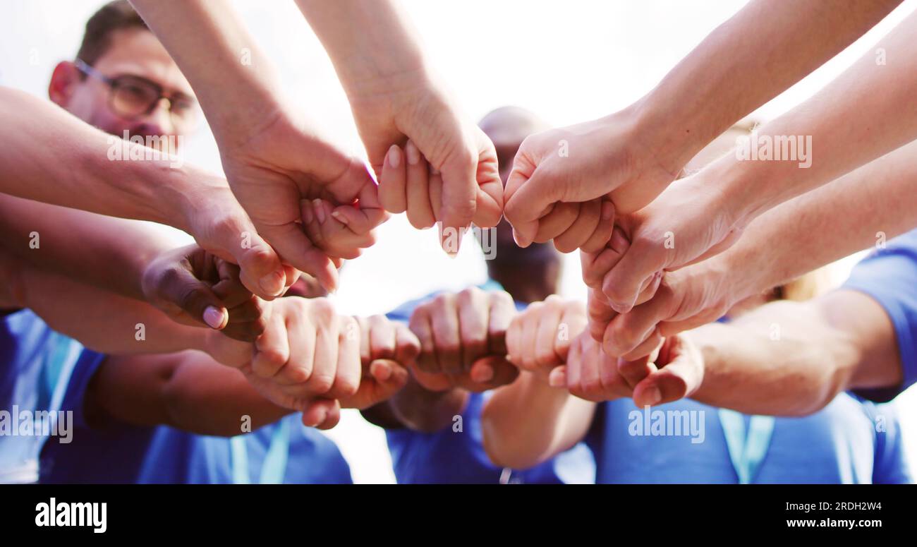 Volunteer Charity Team Joining Hands Together. Teamwork Concept Stock ...