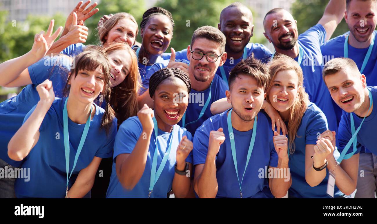 Cheerful Volunteer Team In Park. Multiethnic Teamwork Stock Photo - Alamy