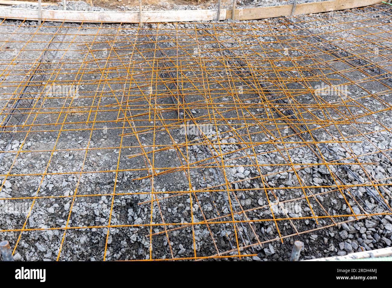 Welded wire mesh, WWM, installed within a sidewalk concrete form prior ...