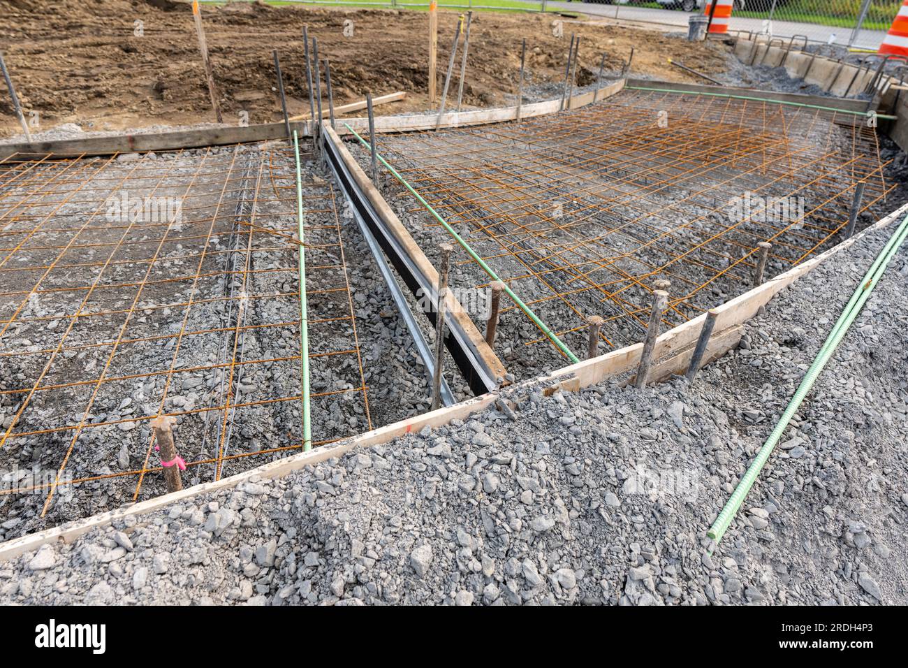 Welded wire mesh, WWM, installed within a sidewalk concrete form prior ...