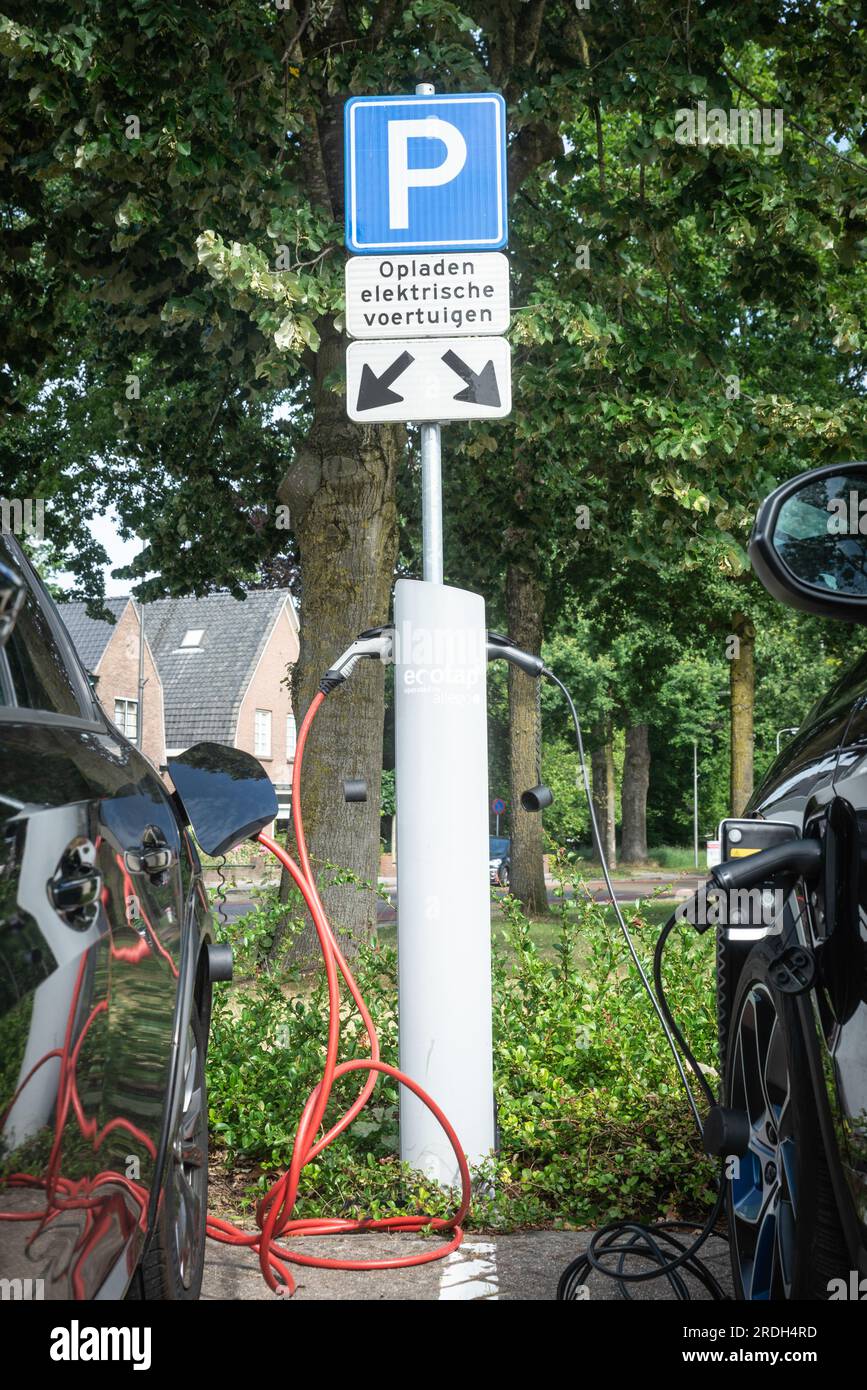 Raalte, the Netherlands - July 21st 2023: Two electric vehicles ...