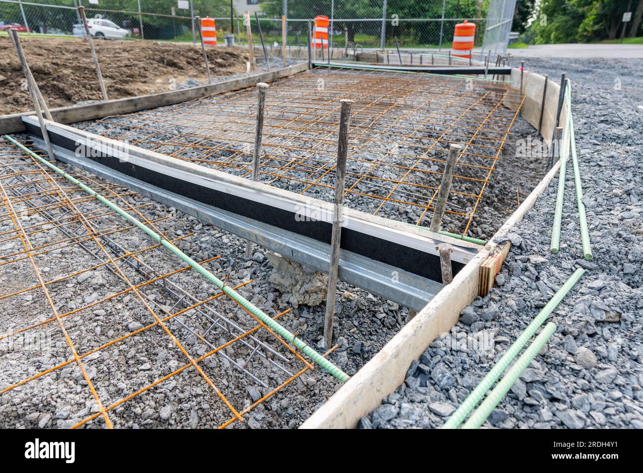 Welded wire mesh, WWM, installed within a sidewalk concrete form prior ...