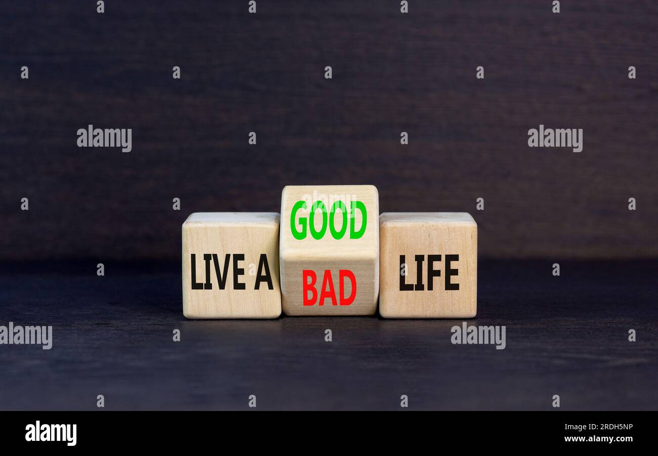 Live good life symbol. Concept word Live a good or bad life on wooden ...
