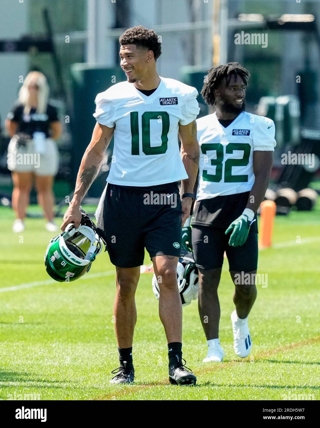 New York Jets wide receiver Allen Lazard speaks with his teammates ...