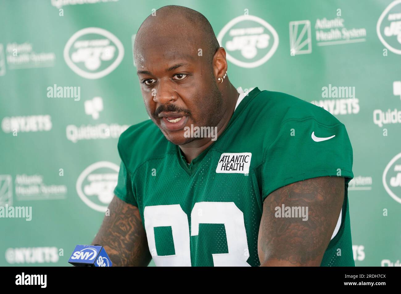New York Jets defensive lineman Quinton Jefferson (93) speaks to ...