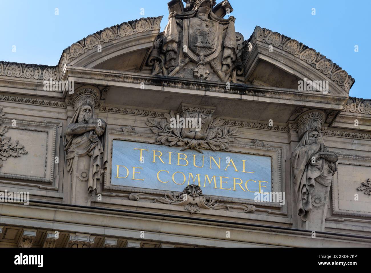 Close-up of the sign at the top of the building housing the Commercial Court ('Tribunal de ...