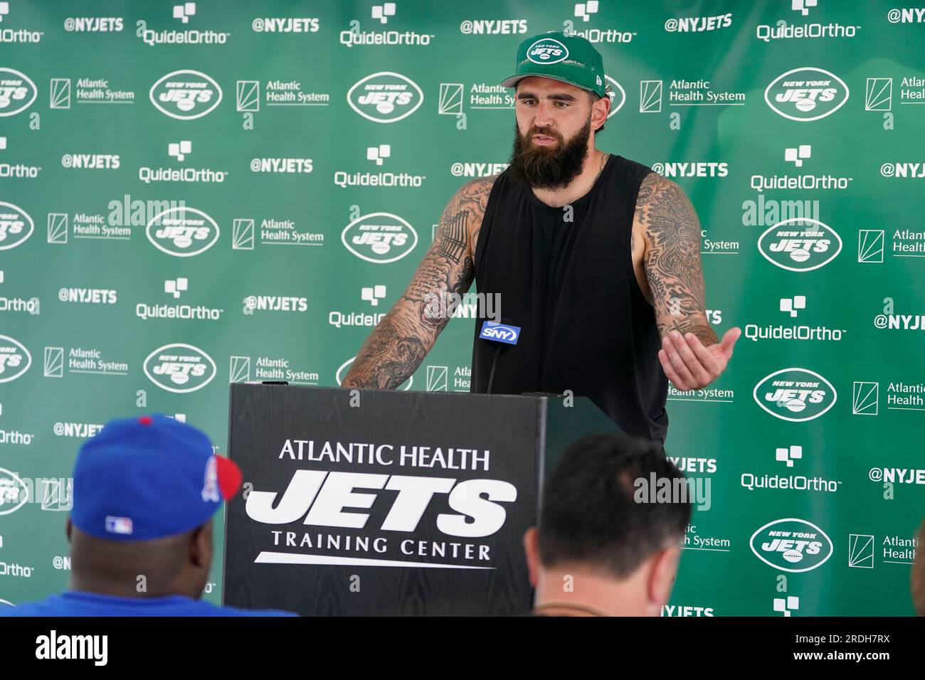 New York Jets tight end Tyler Conklin (83) speaks to members of the ...