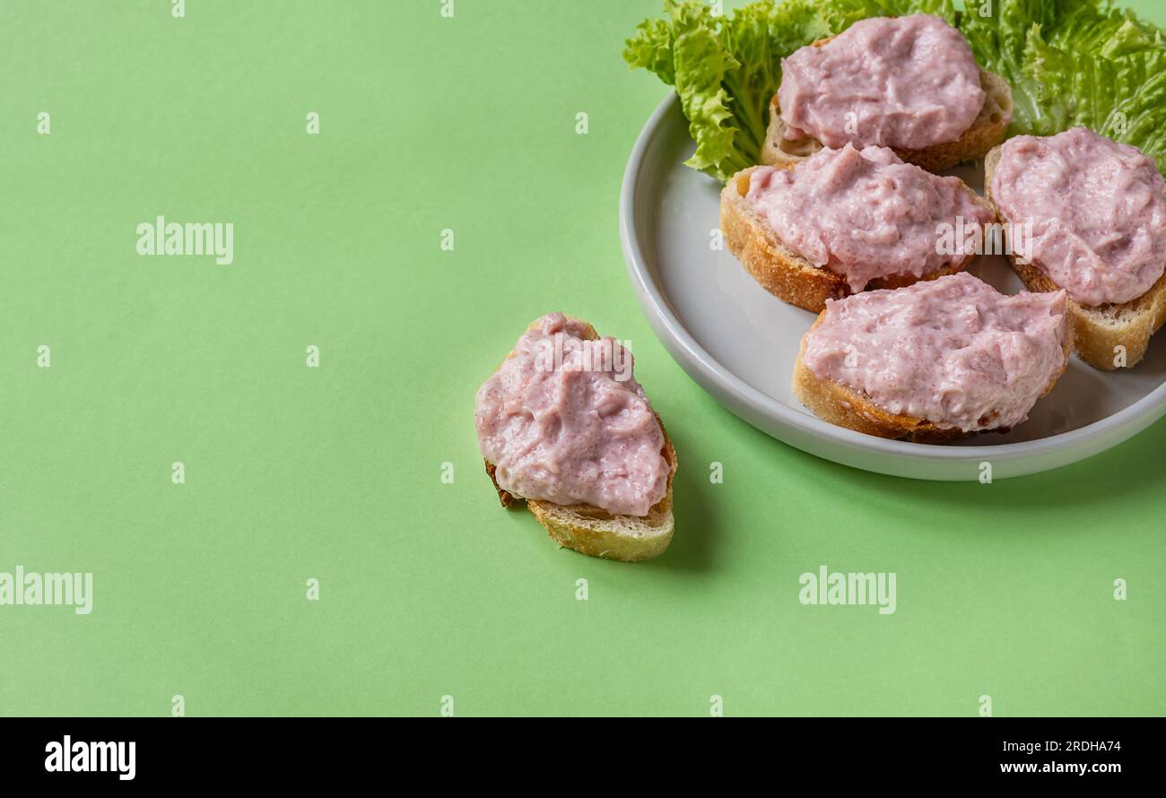 Tarama or taramasalata canape on the green background Stock Photo - Alamy