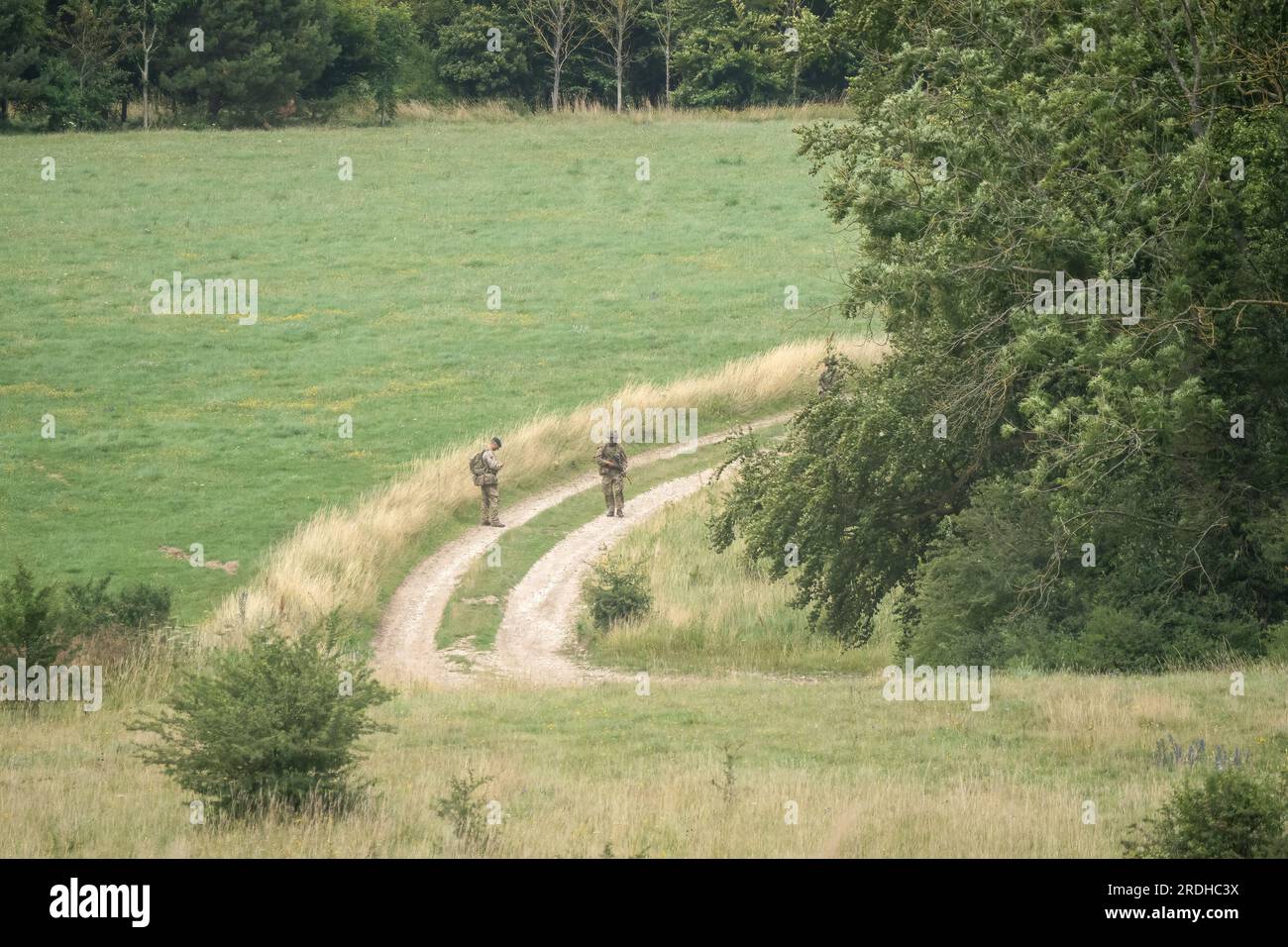 British army infantry soldiers on training take position to cover enemy ...