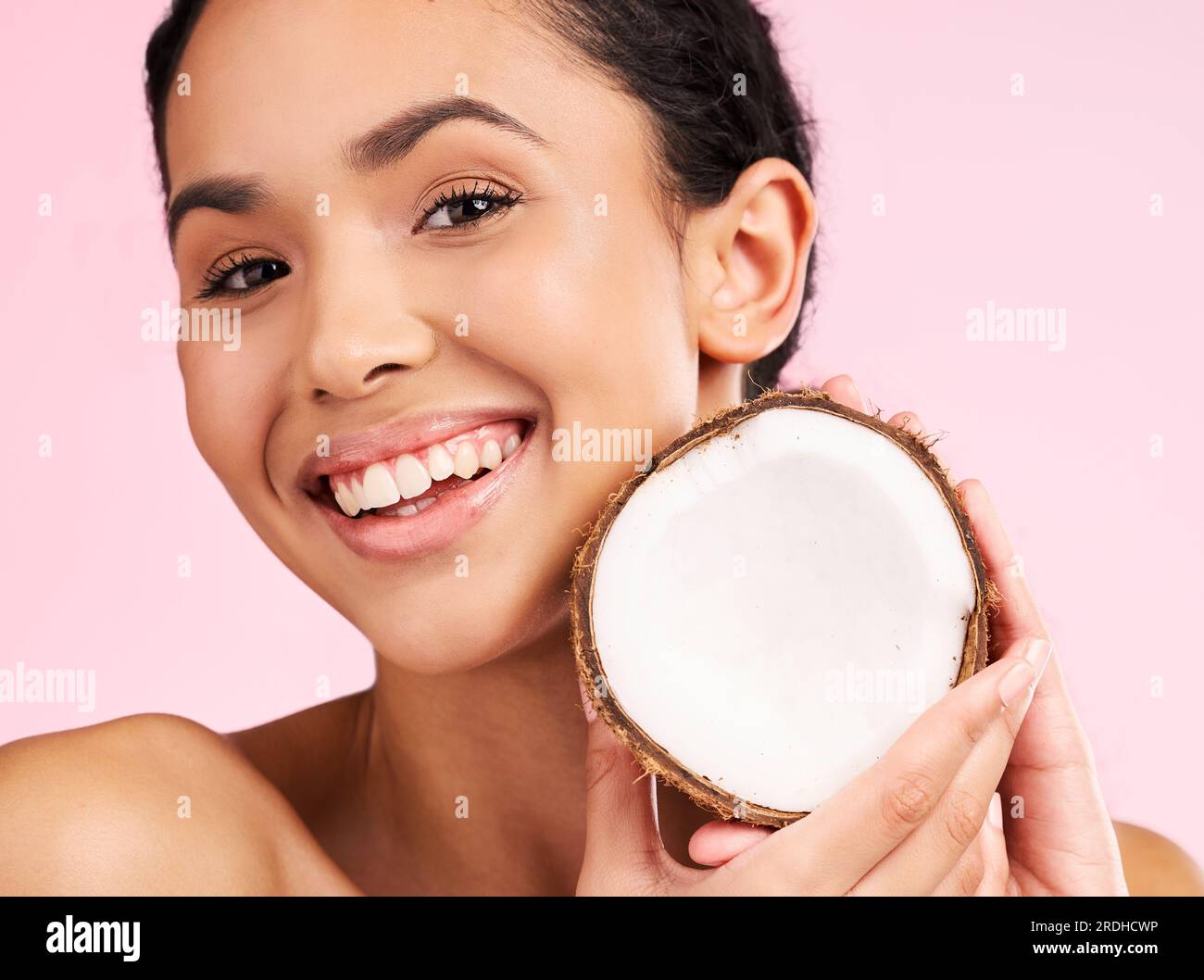 Woman face, coconut fruit and beauty, healthy skincare or vegan cream ...