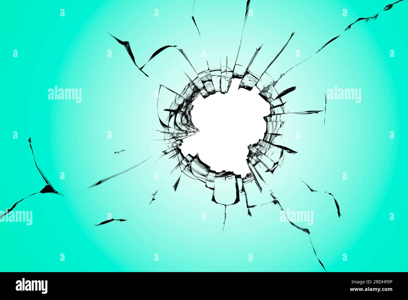 A hole in the glass with a turquoise background, a window broken by ...