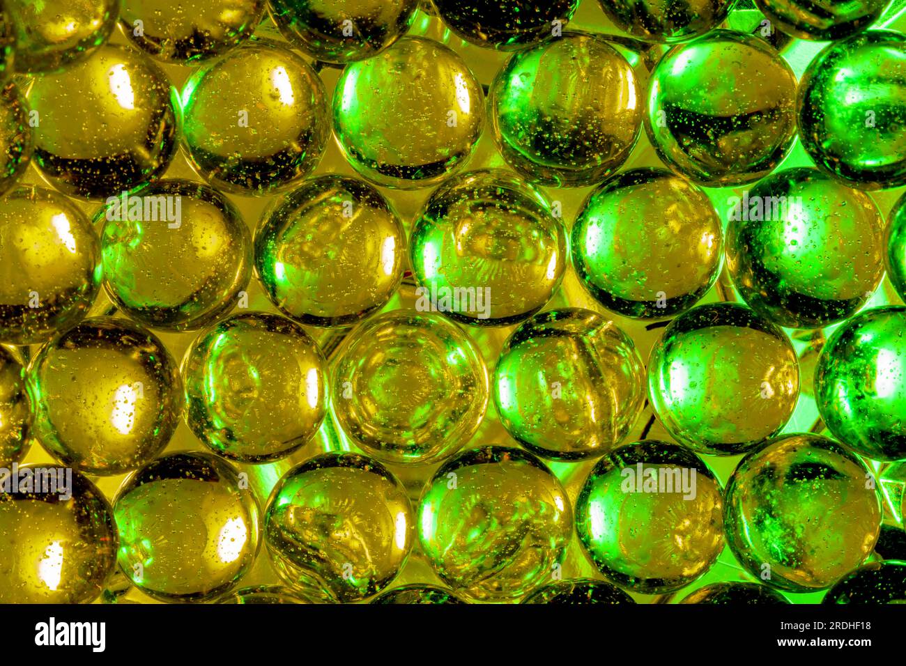 Multiple colored, back lit clear marbles Stock Photo - Alamy
