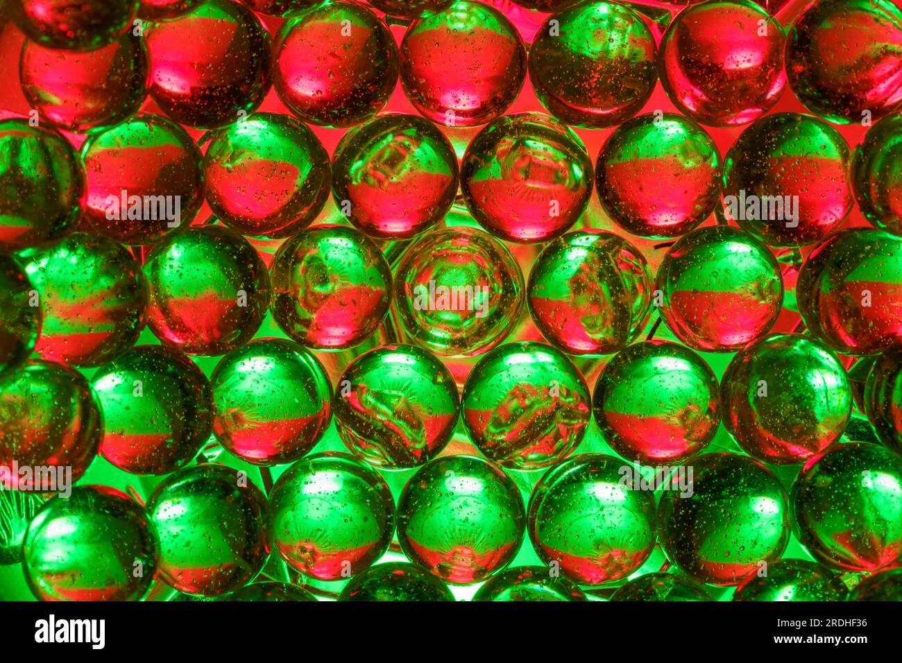 Multiple colored, back lit clear marbles Stock Photo - Alamy