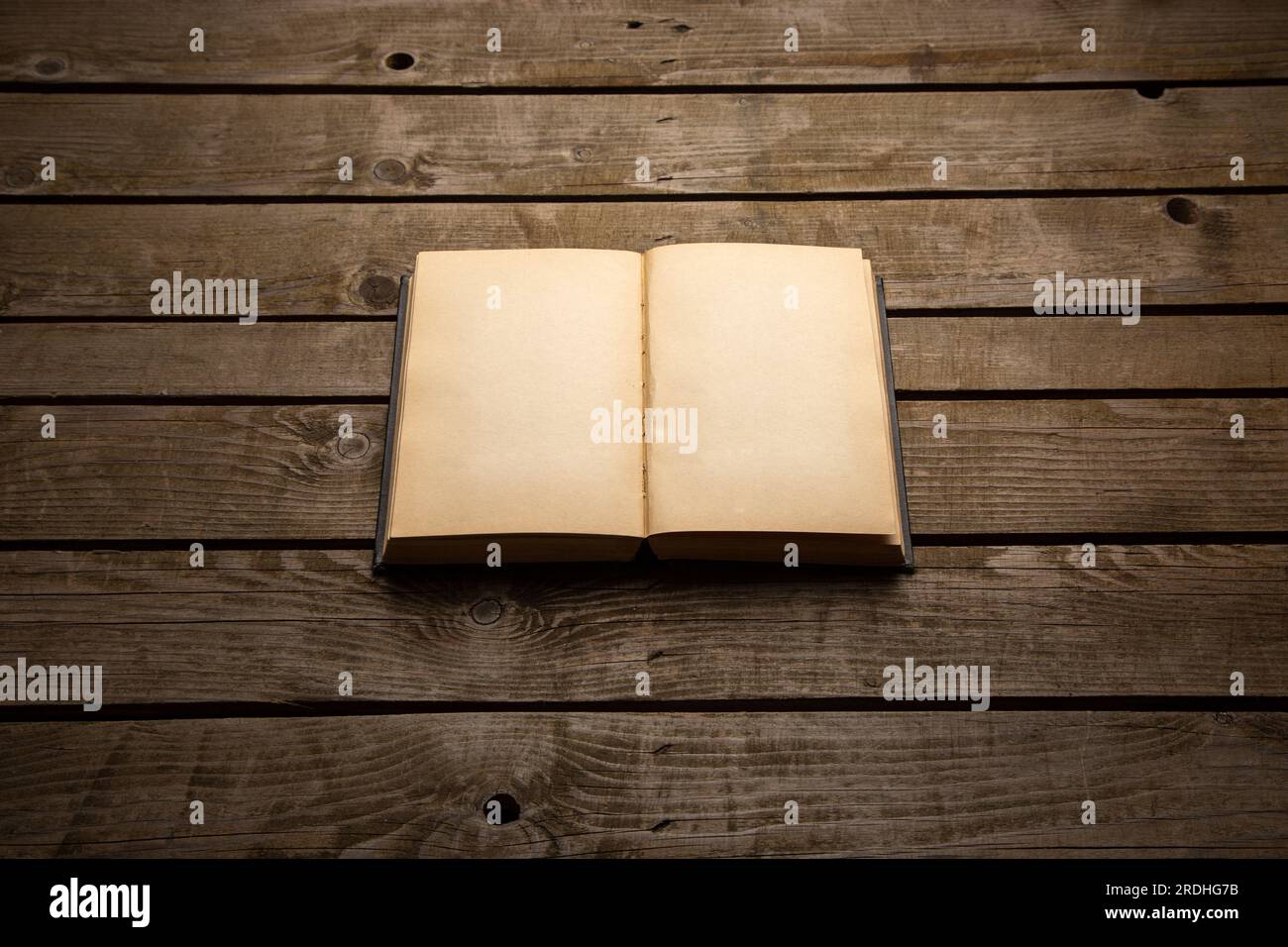 Vintage book, open, on old wooden table, with clipping path. Open Book ...