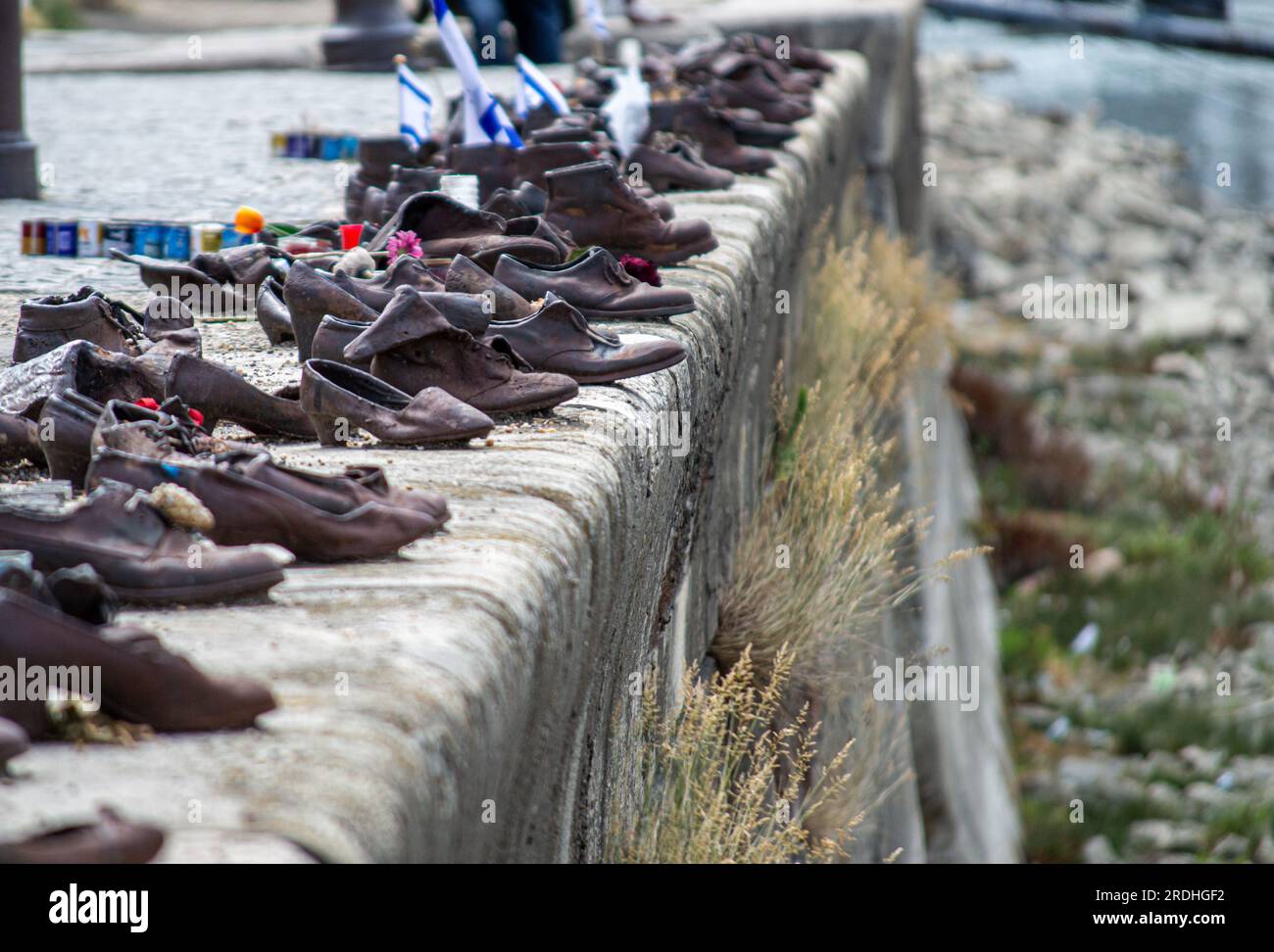 BUDAPEST, HUNGARY - JULY 7, 2023: The Shoes on the Danube Bank is a ...