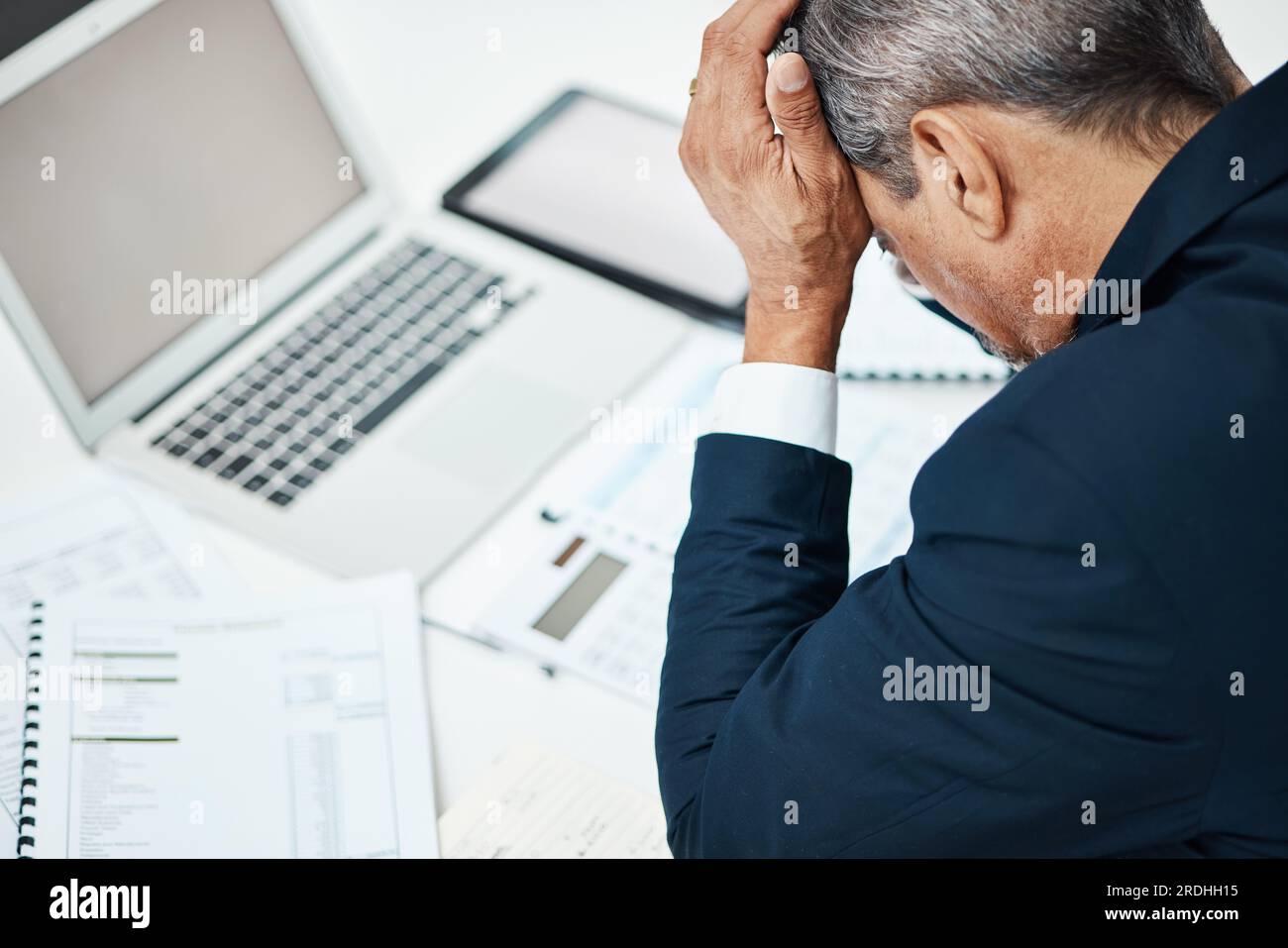 Headache, laptop and business man stress in financial crisis, report or ...