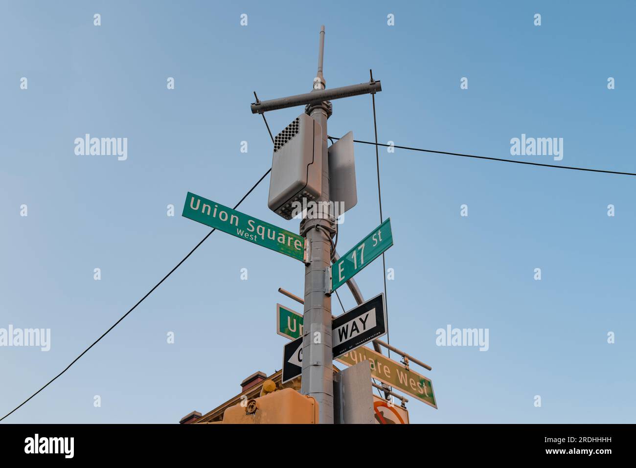 Street name signs on the corners of Union Square West and East 17th ...