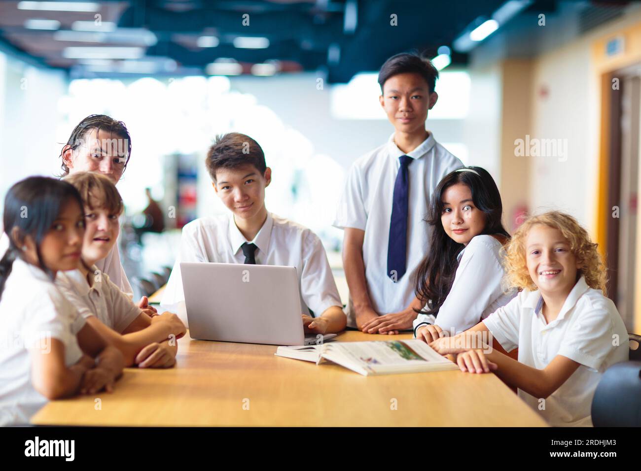 Kids go back to school. Interracial group of children of mixed age on ...