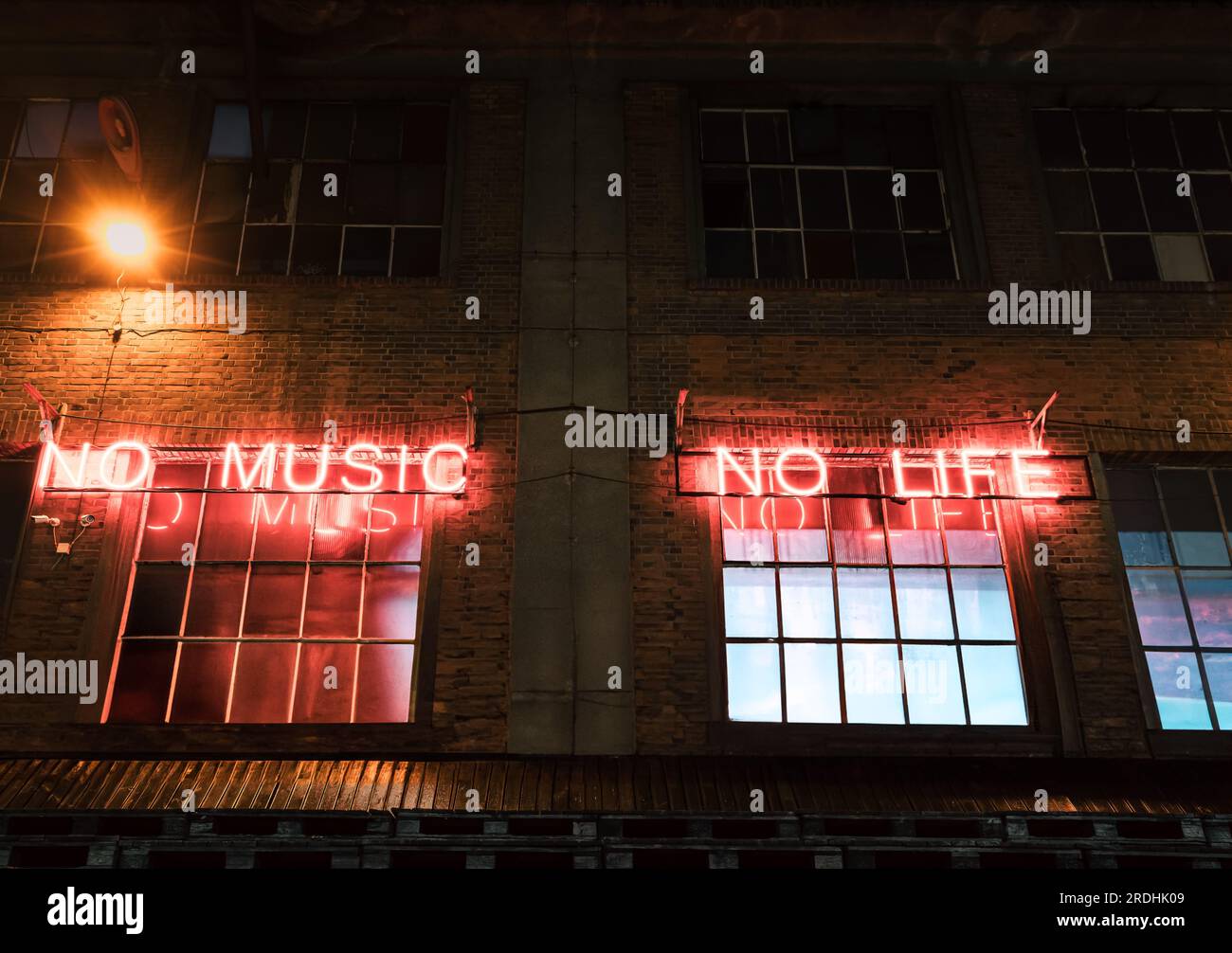 neon inscription at the post-industrial event at the shipyard in gdansk ...