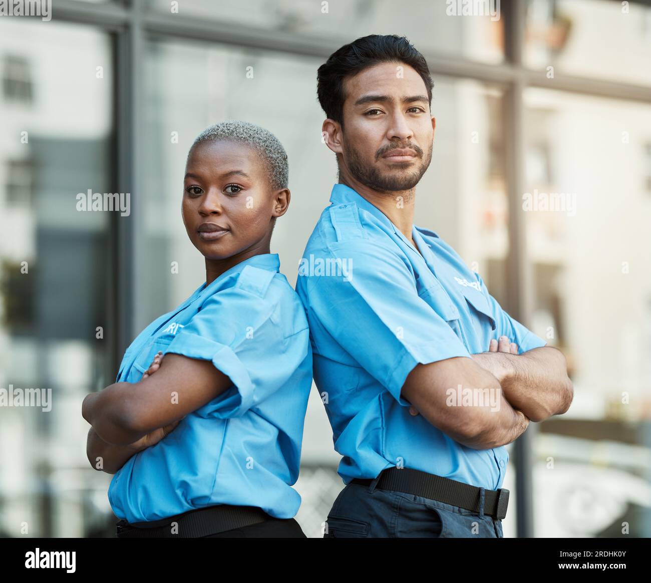 People, portrait and security guard team with arms crossed in city for ...