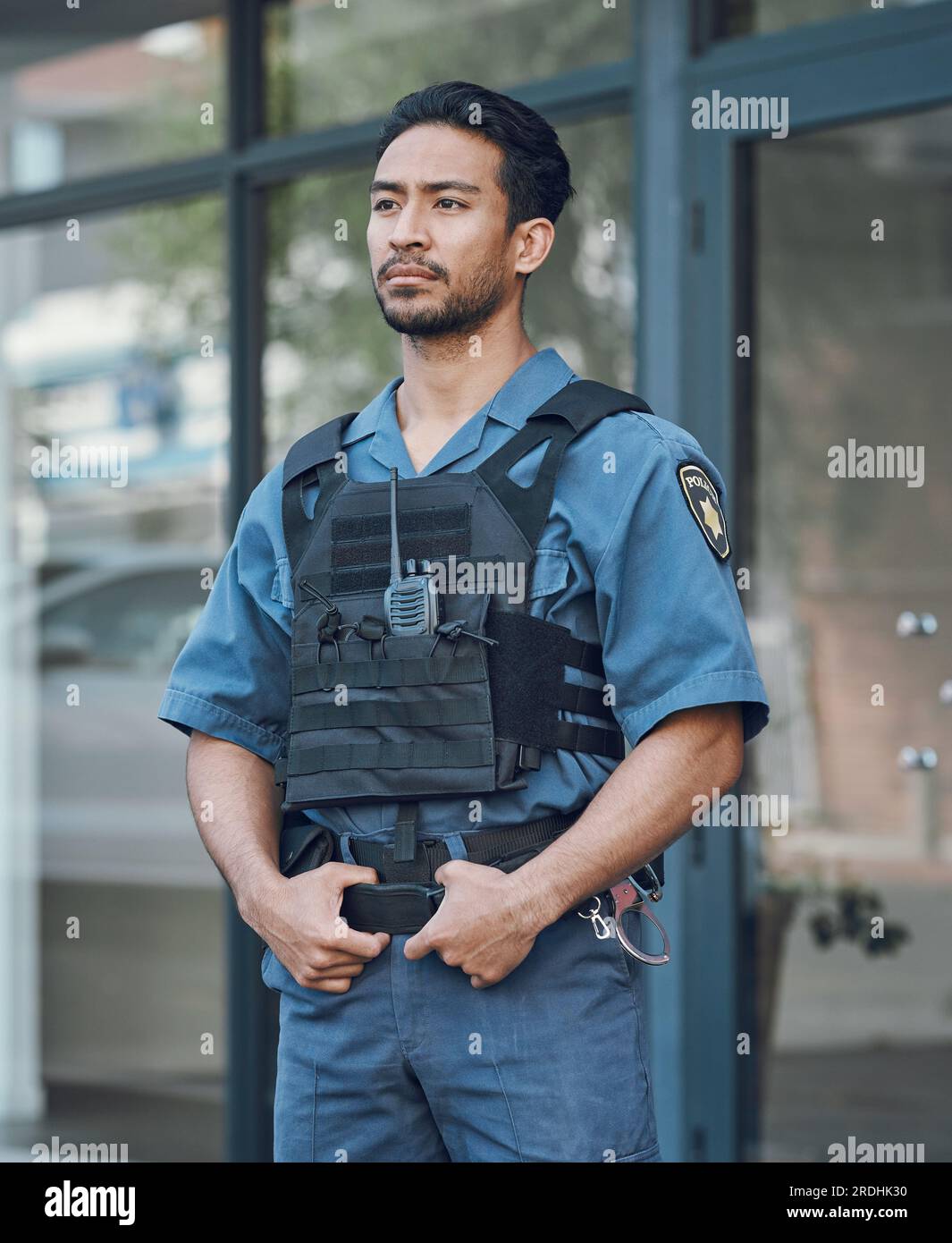 Security, police officer and man in uniform in city for defense ...