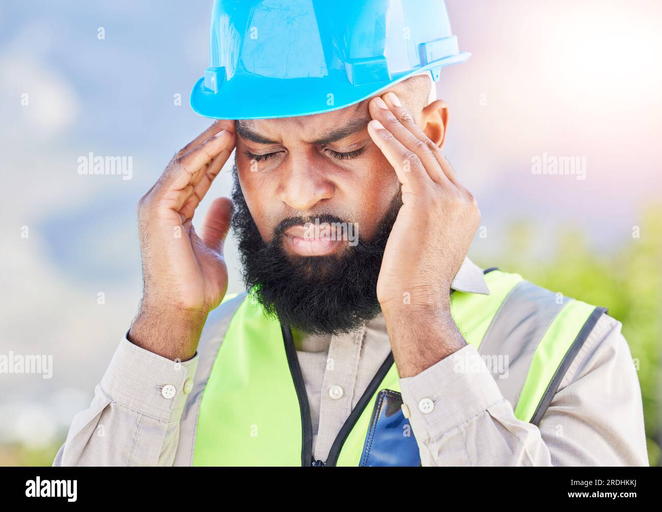 Black man, architect and headache in city from stress, anxiety or ...