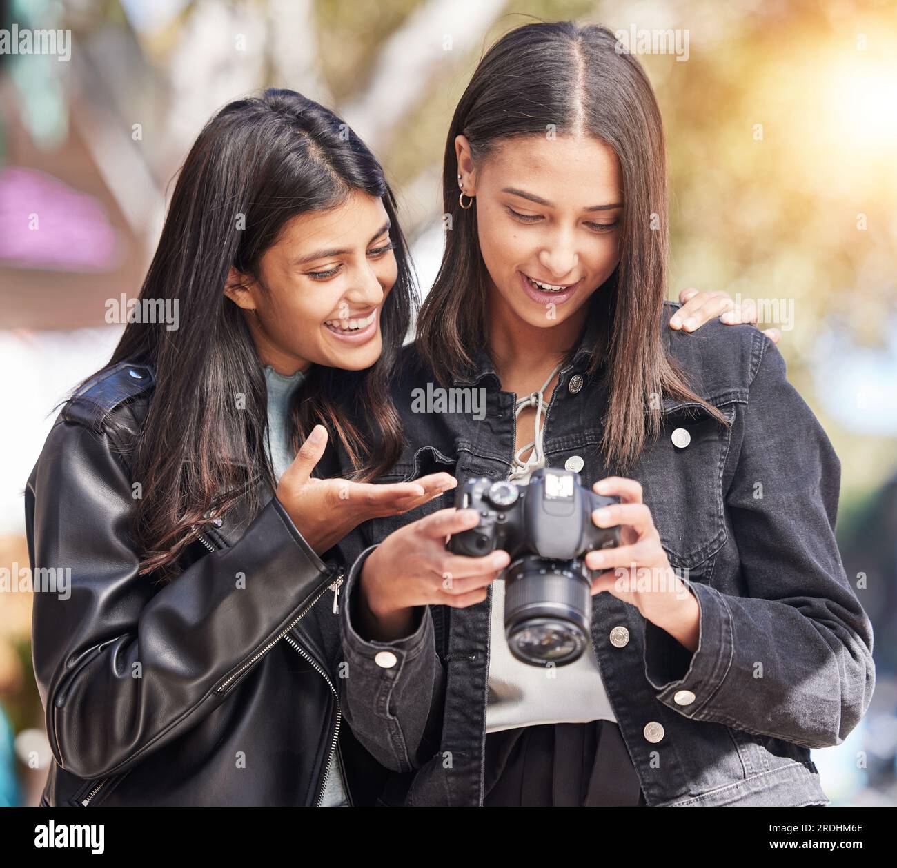 Photography camera, city and happy friends check photo, picture or ...