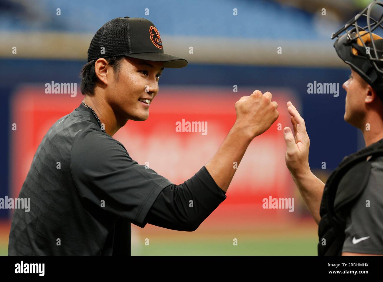 Baltimore Orioles relief pitcher Shintaro Fujinami, left, greets ...