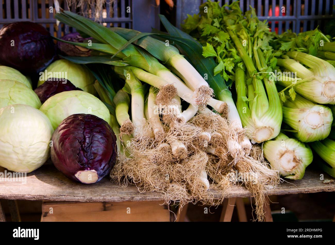 Fresh healthy vegetables as cabbage, leek and stalk celery for sale at ...