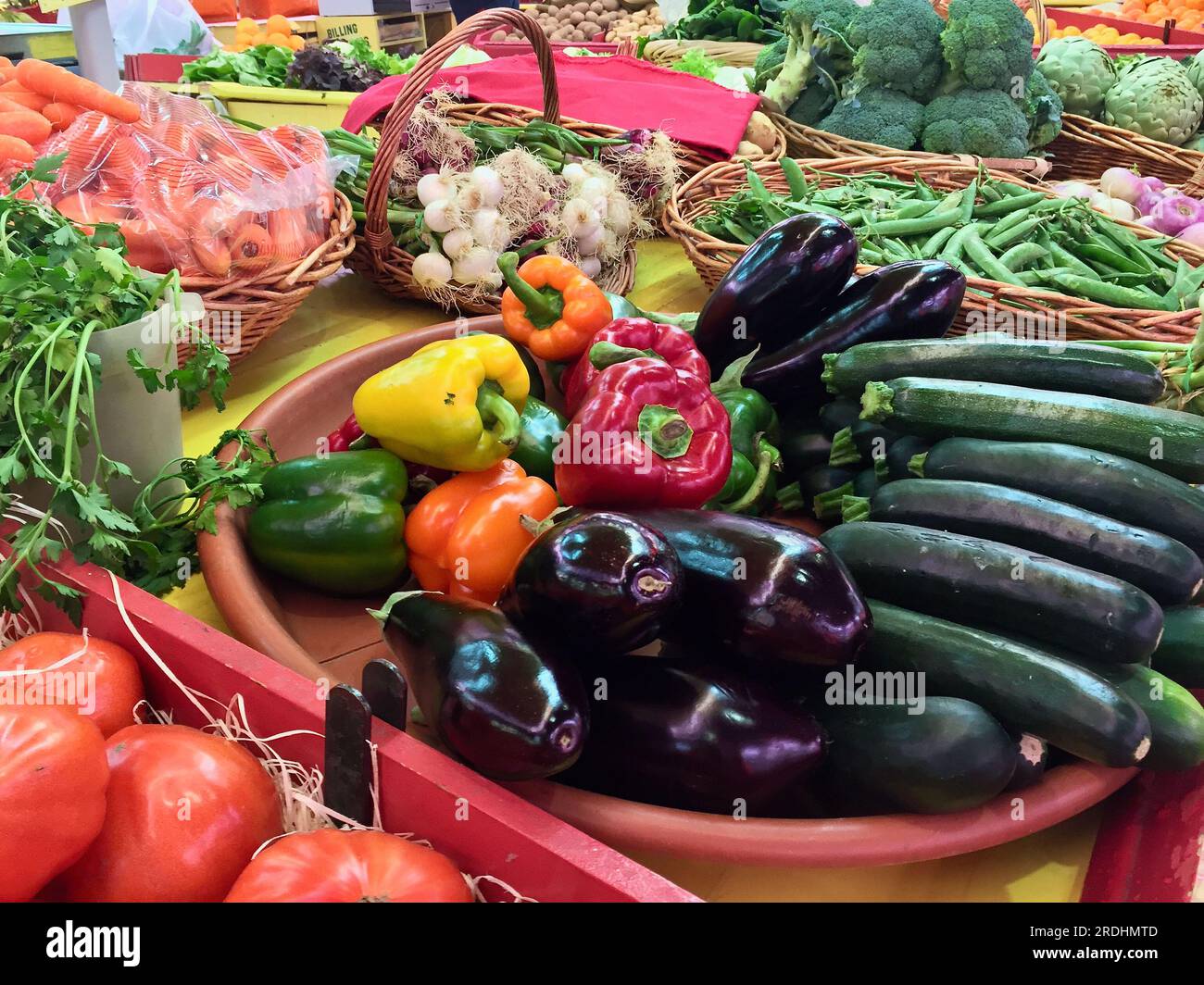 Fresh organically grown vegetables in market stall for sale at farmers ...