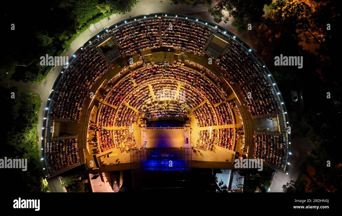 aerial view with drone of people watching concert and having fun in ...