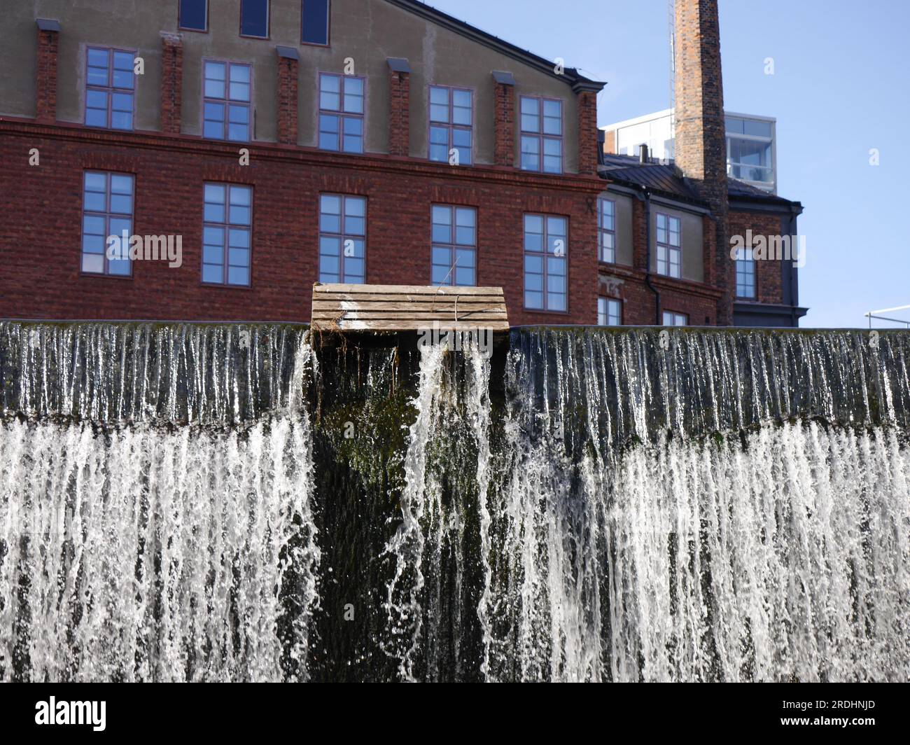 A waterfall at old industrial buildings Stock Photo - Alamy
