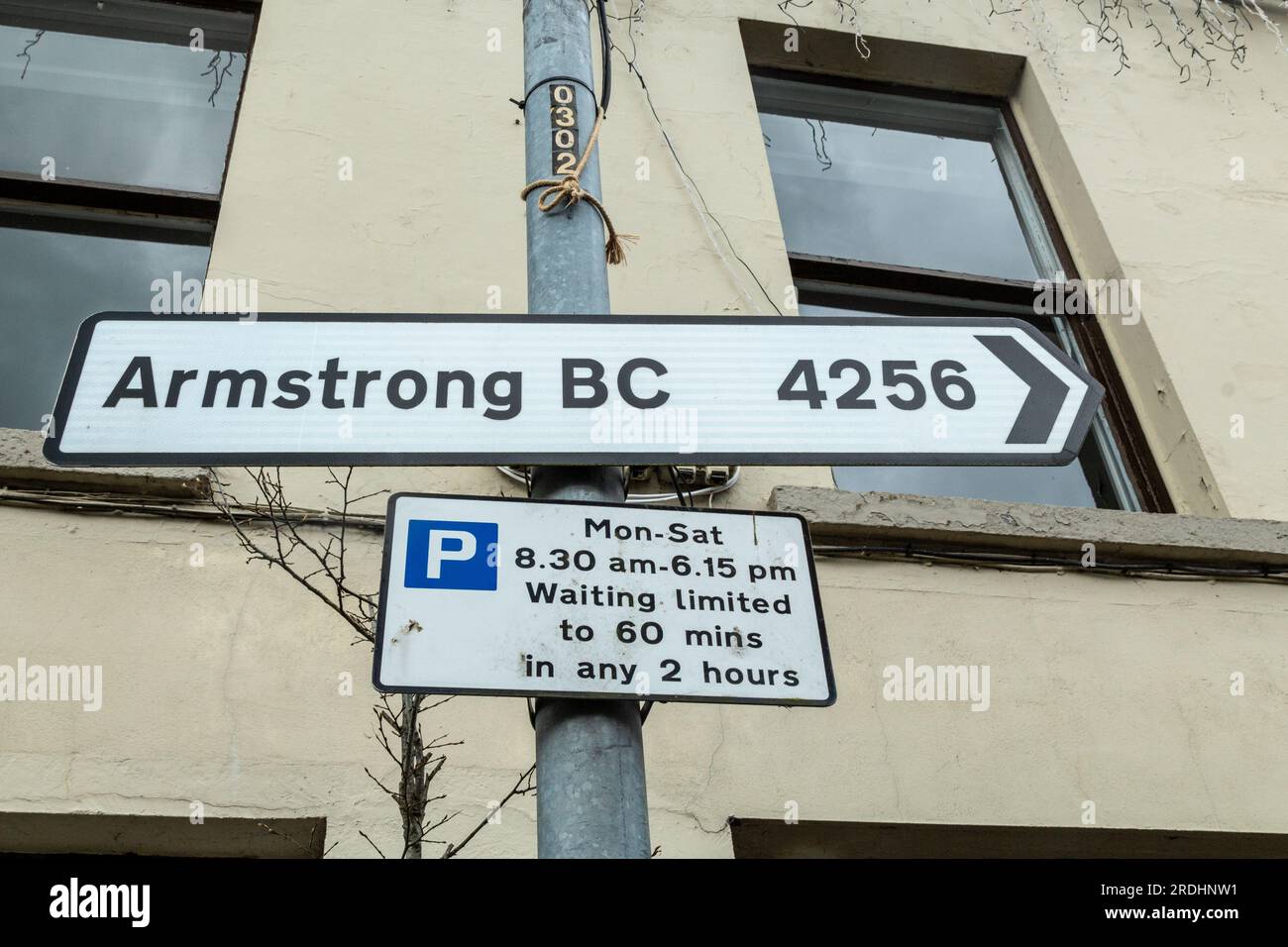 In Rathfriland, Co. Down, Northern Ireland a road sign points to sister ...
