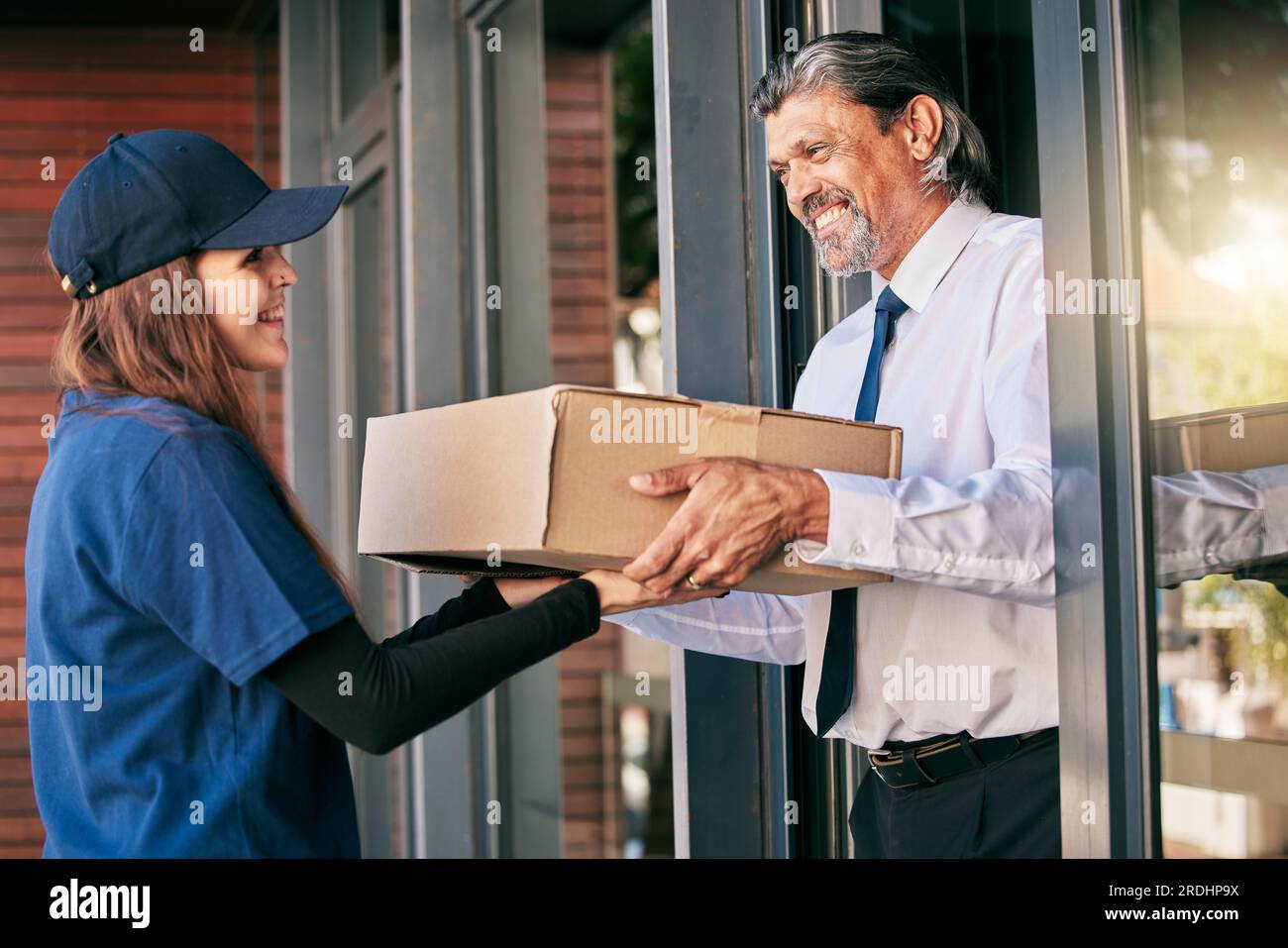 Delivery, box and business man at front door for package, ecommerce and ...