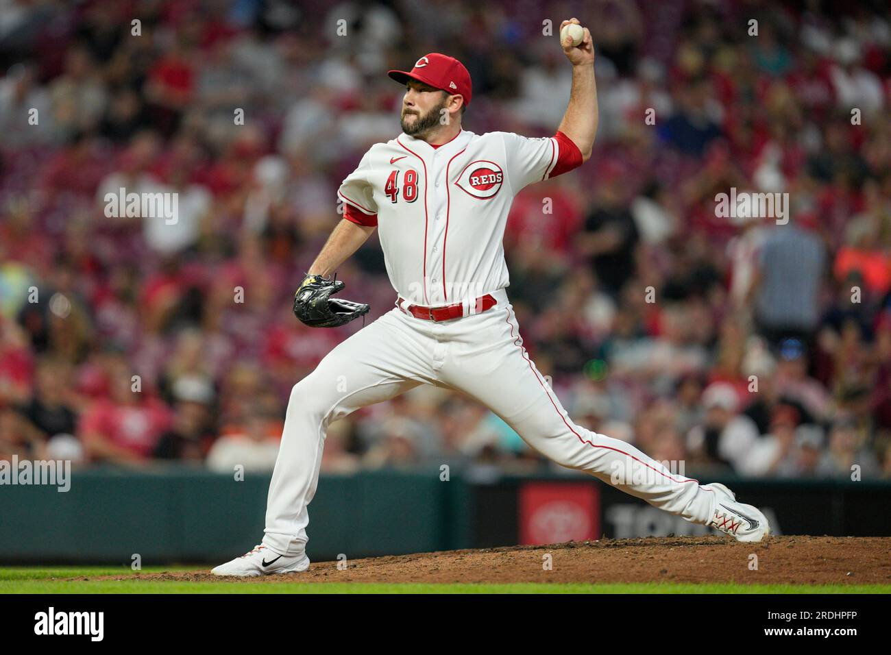 Cincinnati Reds relief pitcher Alex Young (48) throws during a baseball ...