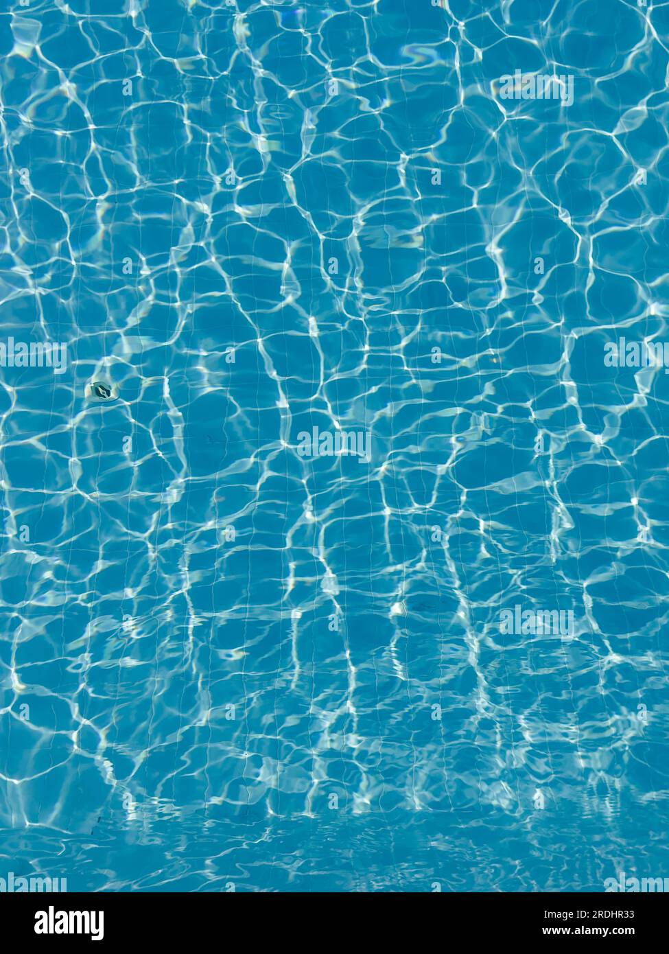 Water background, ripple and flow with waves. Summer blue swiming pool ...