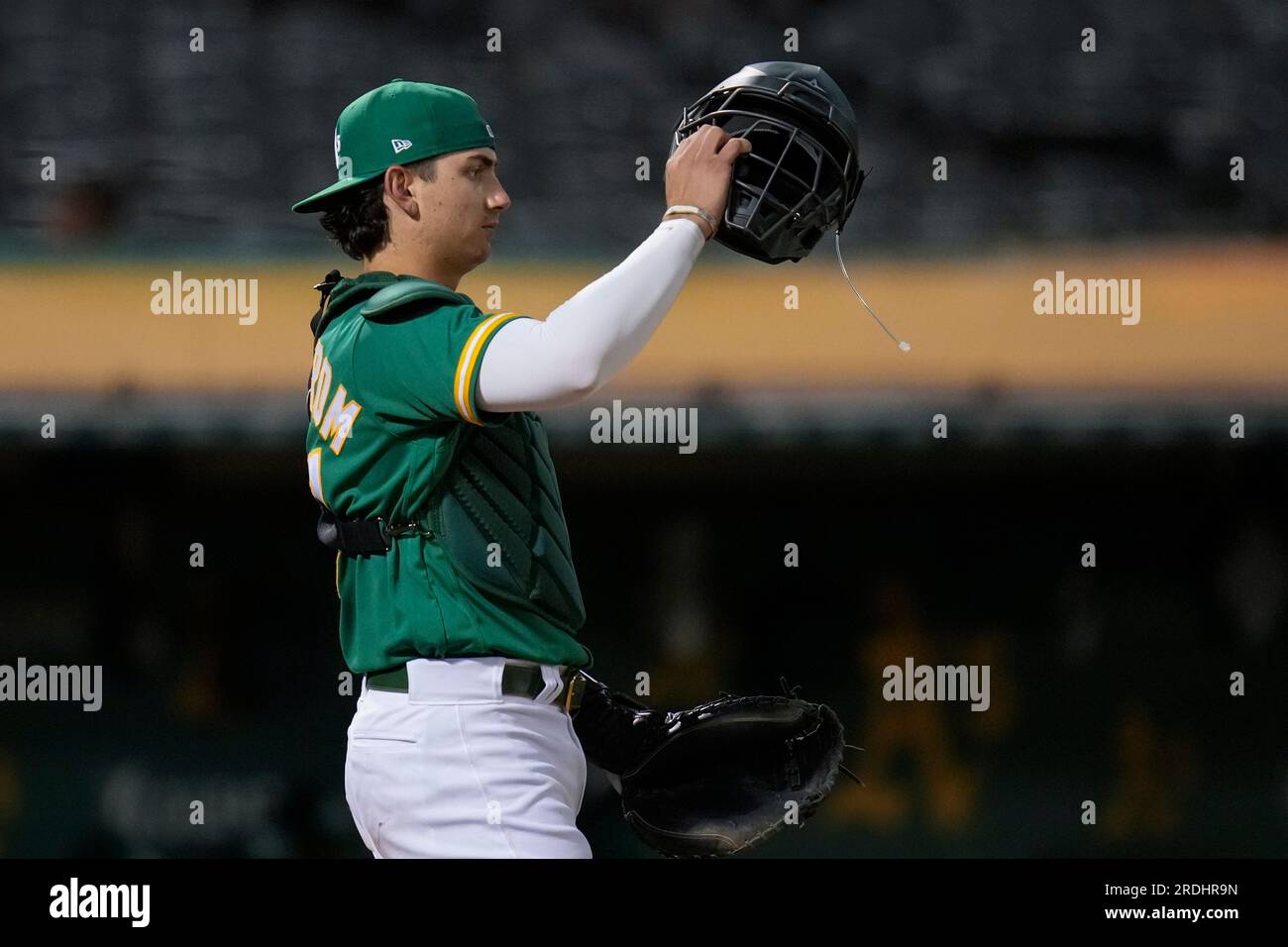 Oakland Athletics catcher Tyler Soderstrom adjusts his helmet during ...