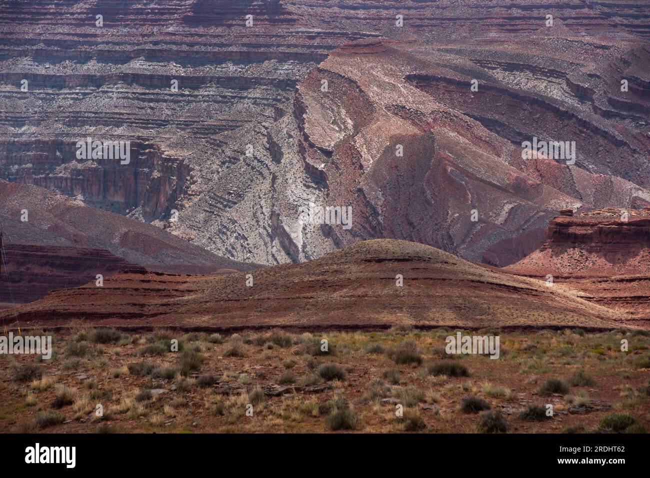 Sedimentary layers, exposing multiple colours of rock near Mexican Hat ...